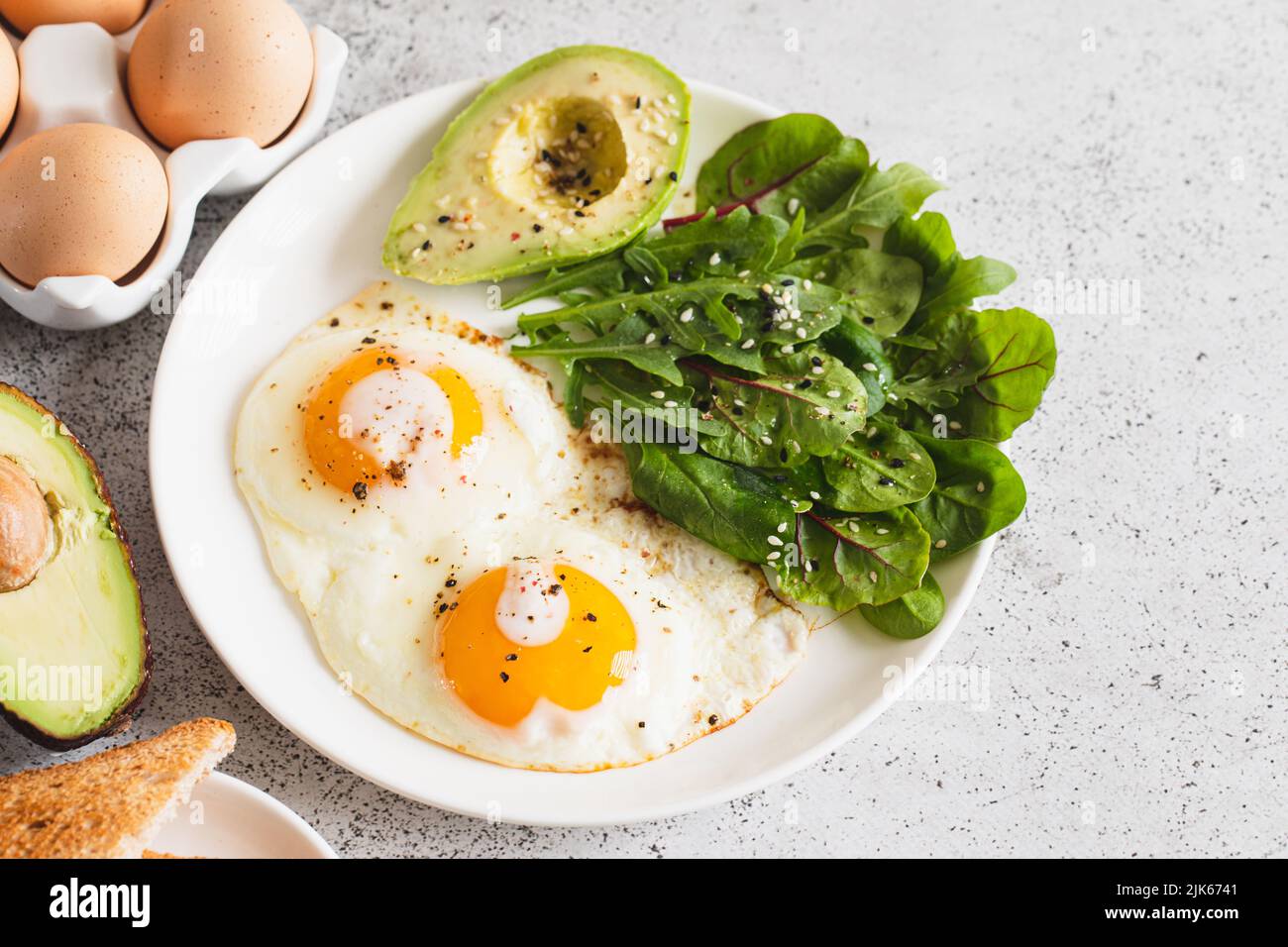 Healthy Breakfast with Wholemeal Bread Toast, Eggs with Green Salad ...