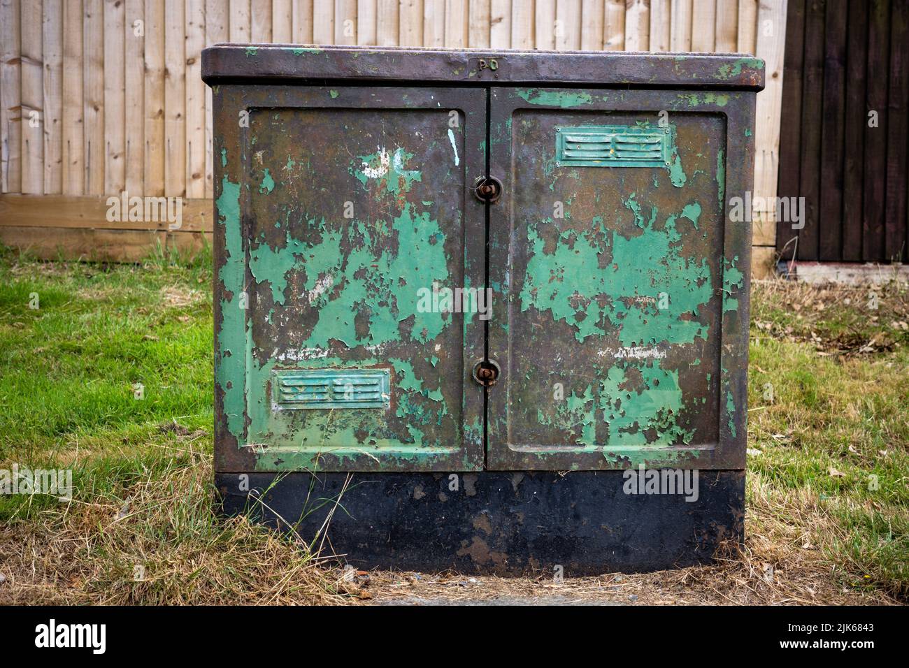 Green paint peeling on a old BT junction box, Bristol (Jul22 Stock ...