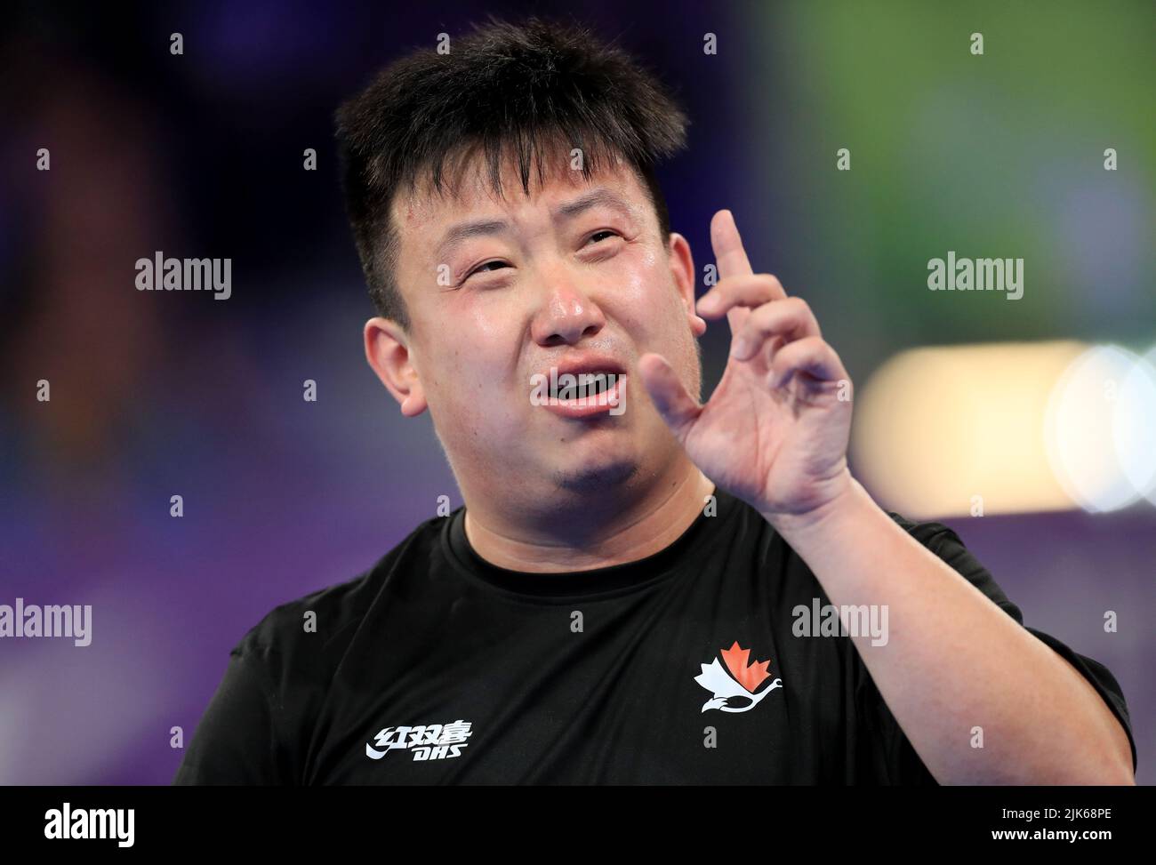 Canada’s Eugene Wang reacts during his match against Singapore’s Zhe Yu Clarence Chew at The NEC ...
