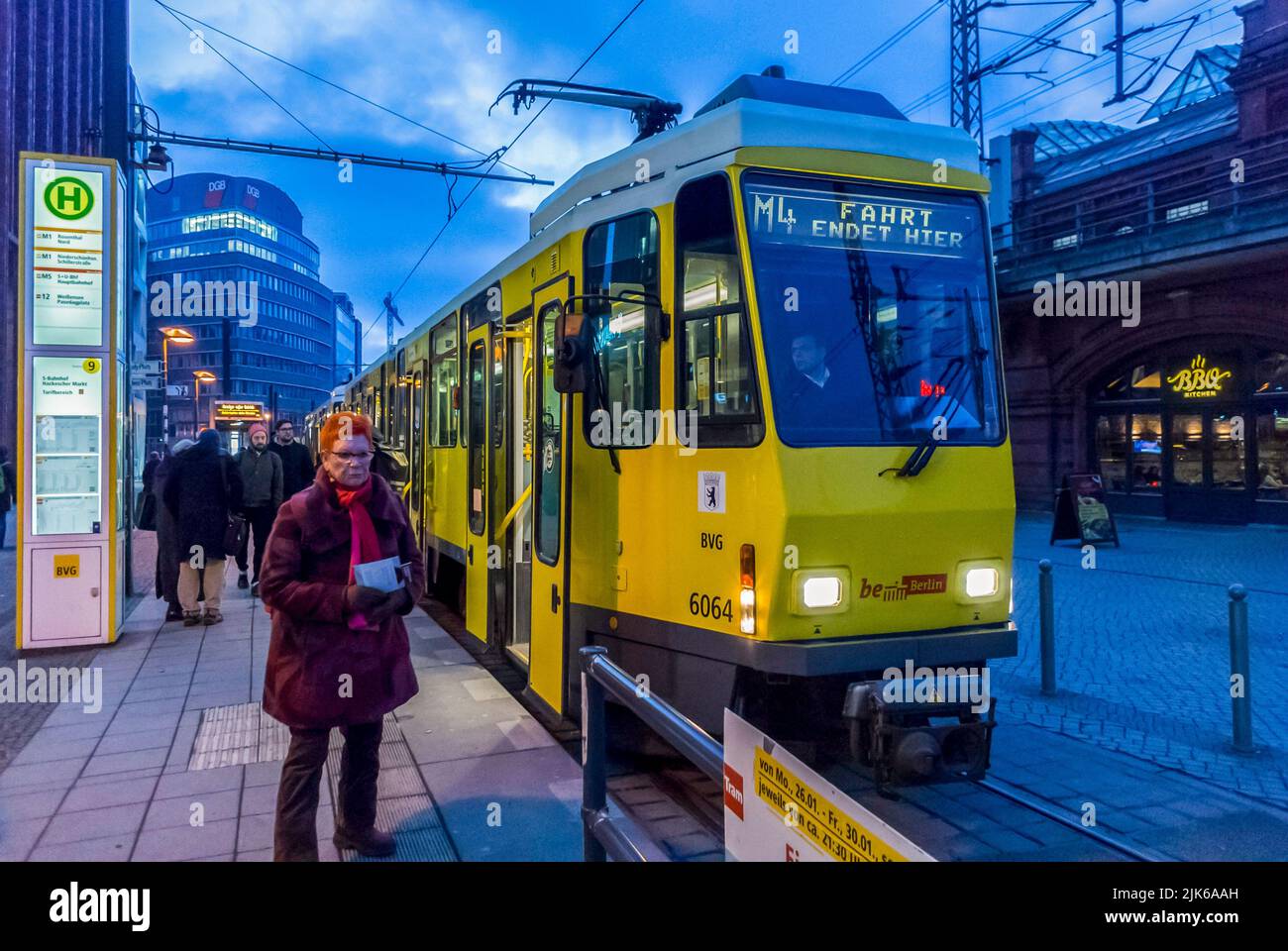 Berlin, Germany, Woman Walking at Night, views Tramway, Tram Train on ...
