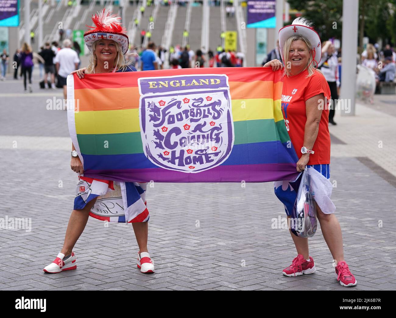 England fans with a flag pose on Wembley Way before the UEFA Women's ...