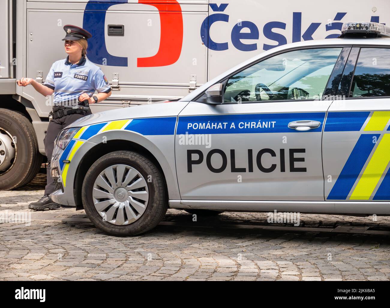 Prague, Czech Republic - June 2022: A police car and officer on the ...