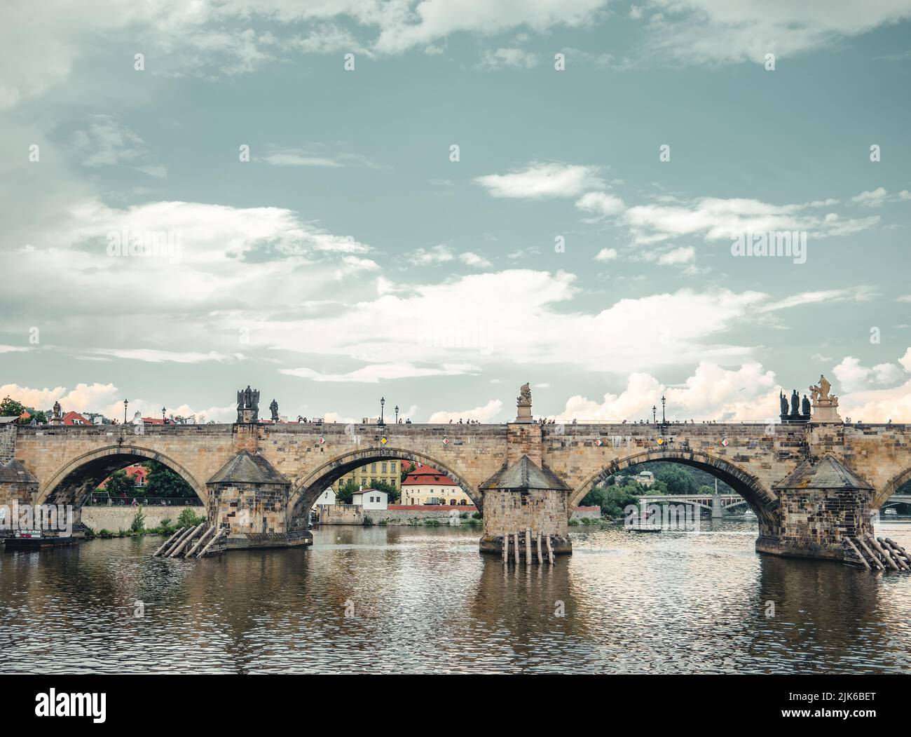 Prague, Czech Republic - June 2022: View with the Charles Bridge main touristic attraction ...