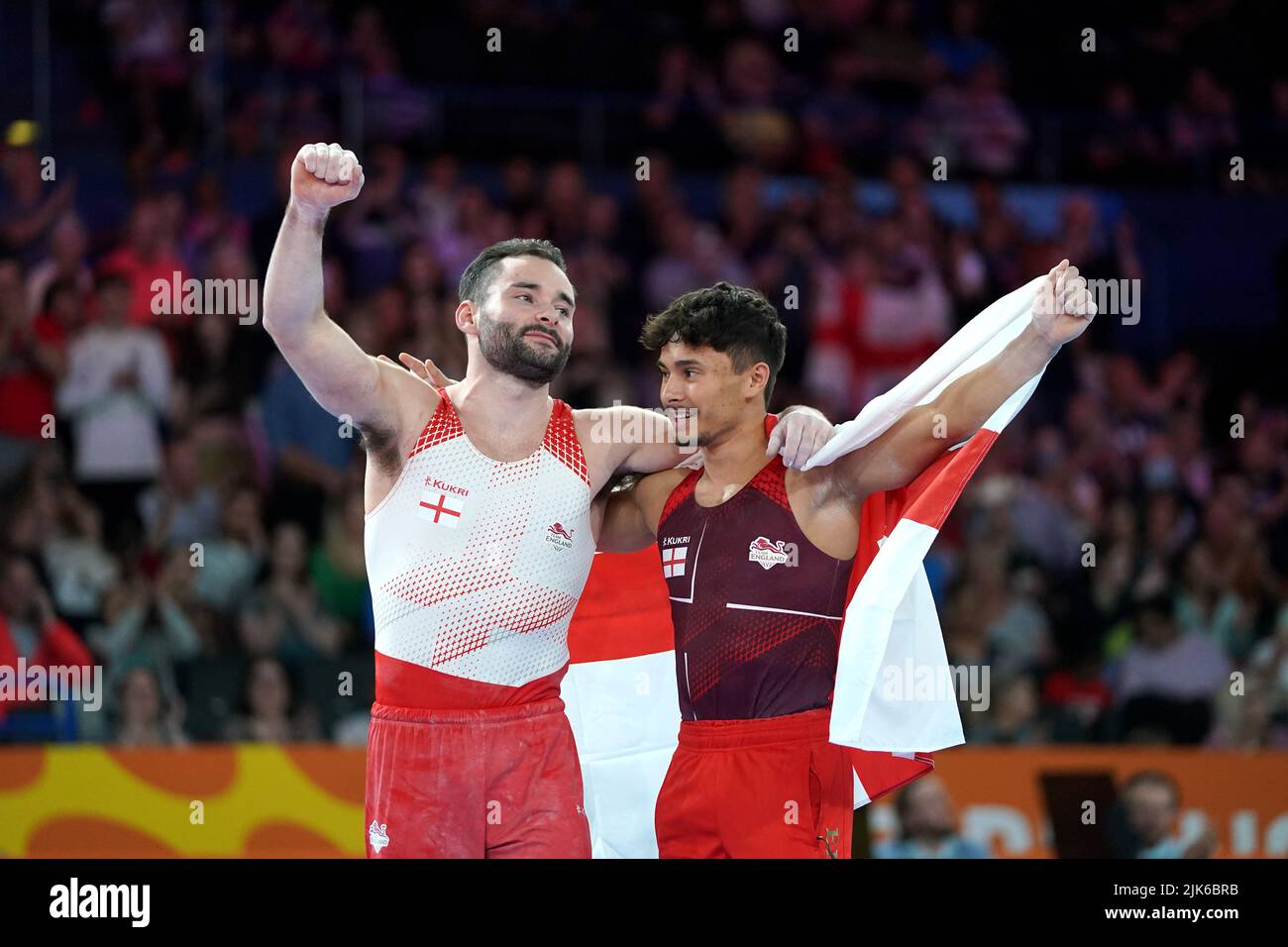 England's Jake Jarman (right) and James Hall share a moment after the ...