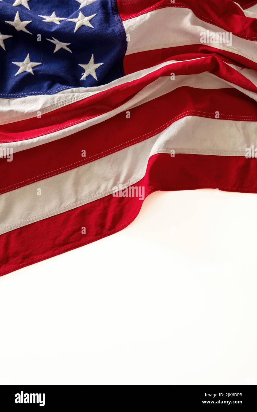 USA flag rippled on white background, copy space. National American ...