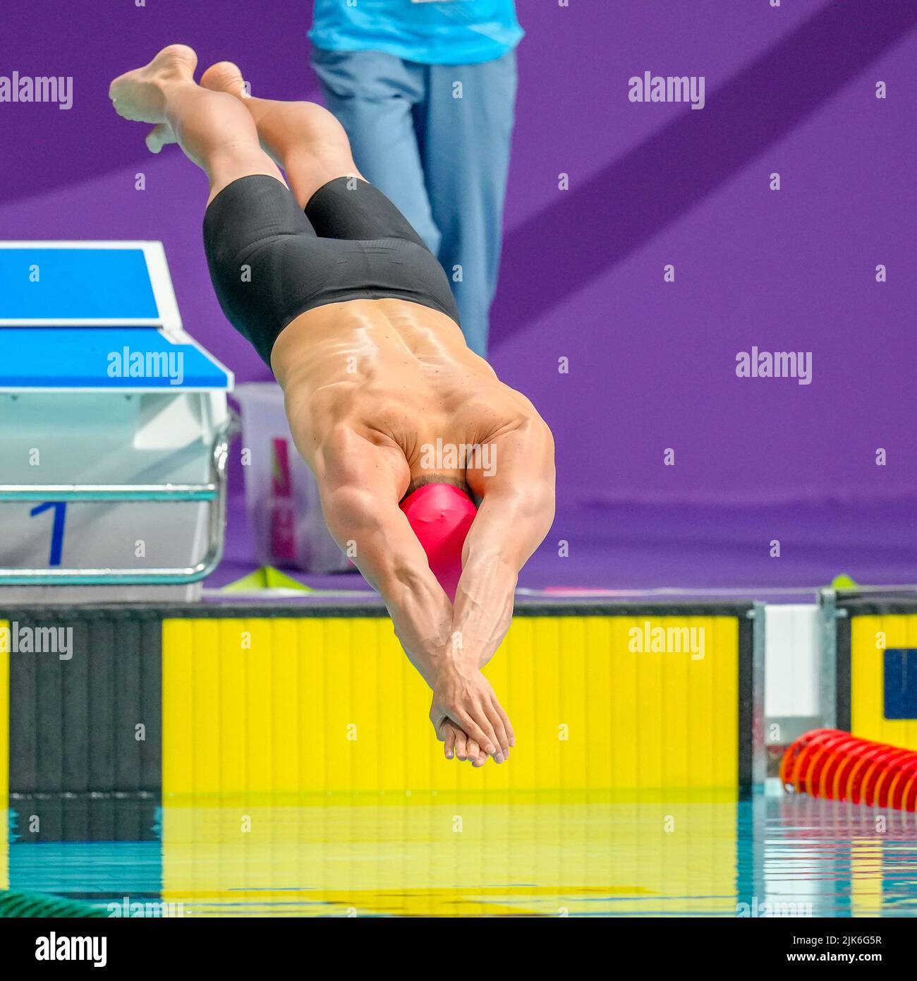 Adam BARRETT (ENG) dives in for the Men's 50m Butterfly Semi-Final 2 at ...