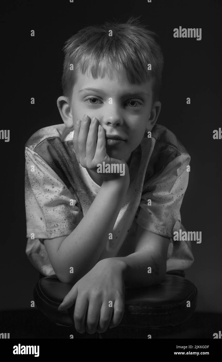 Young boy in studio pose Stock Photo - Alamy