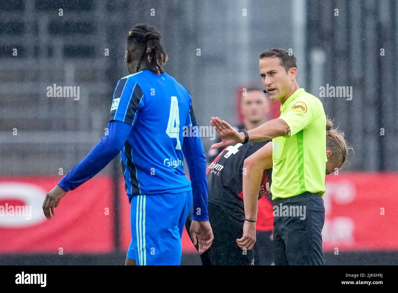 ALMERE, NETHERLANDS - JULY 31: Calvin Bassey of Ajax, referee Martin ...