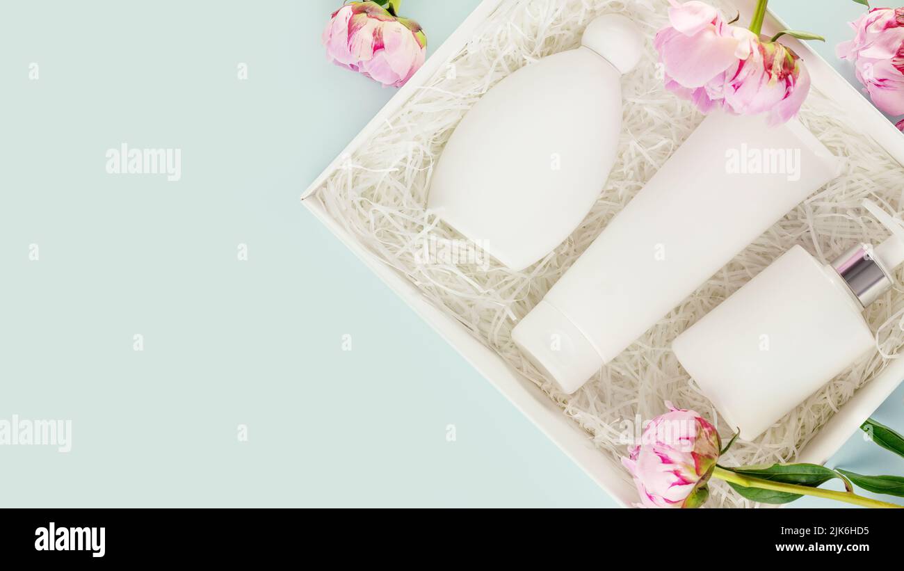 Beauty care, holiday composition with gift, white box with cosmetics ...