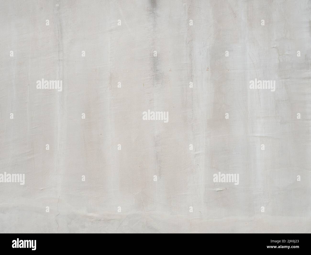 White plastered non-uniformly coated wall. Full screen photo. Not a ...