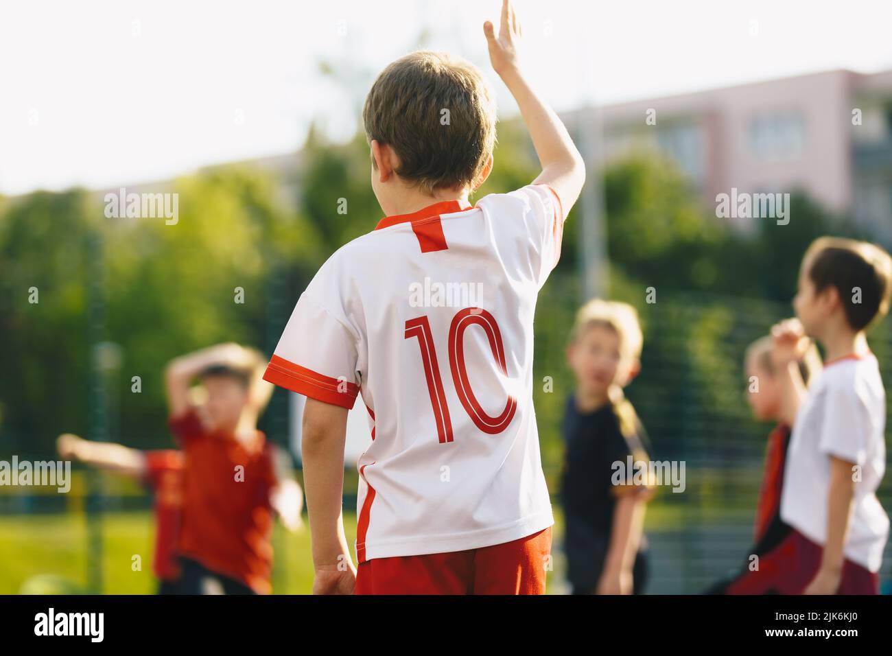 Kids play sports during school physical education training. Elementary ...