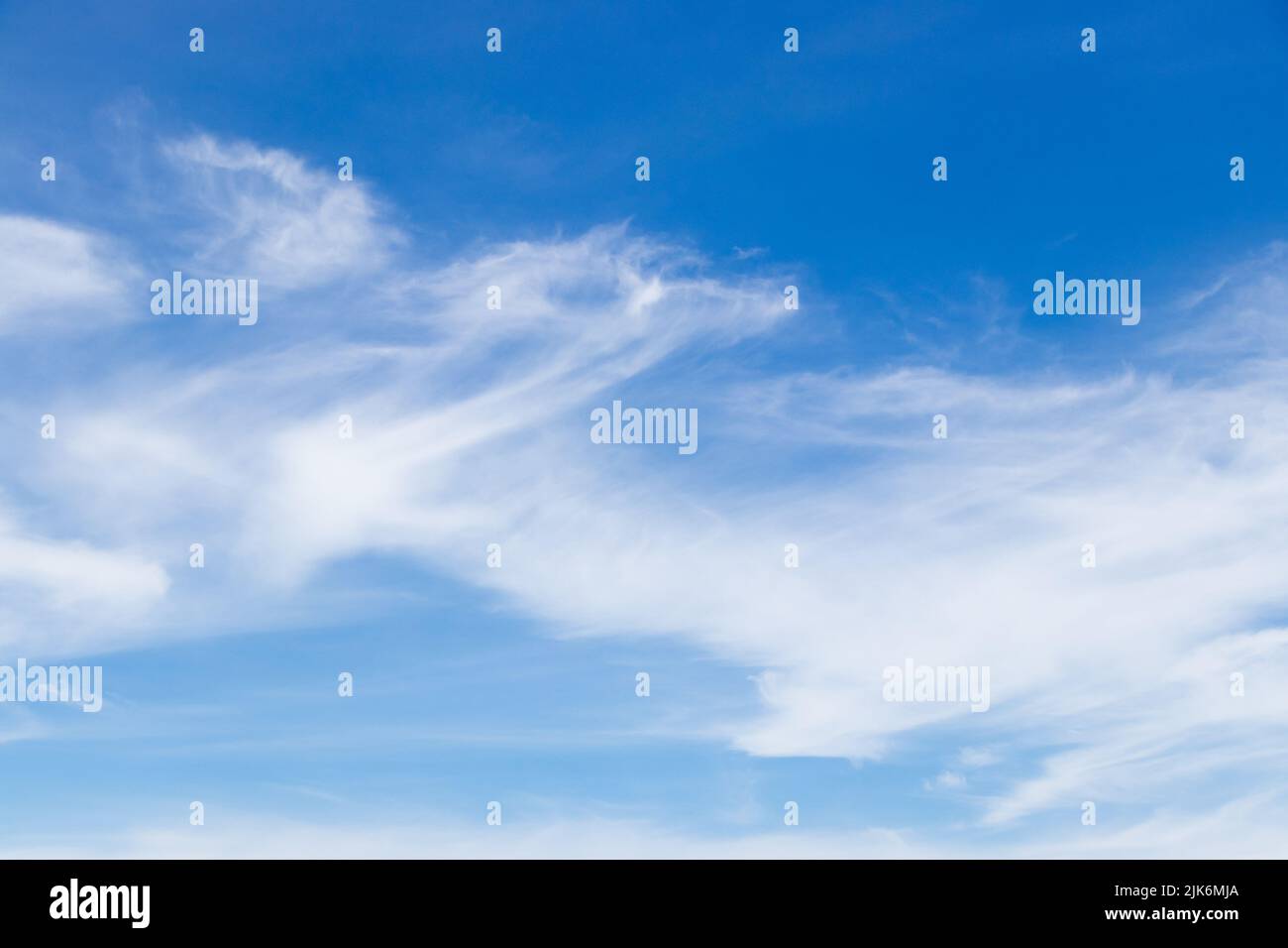Clear blue color sky with white cloud background Stock Photo - Alamy
