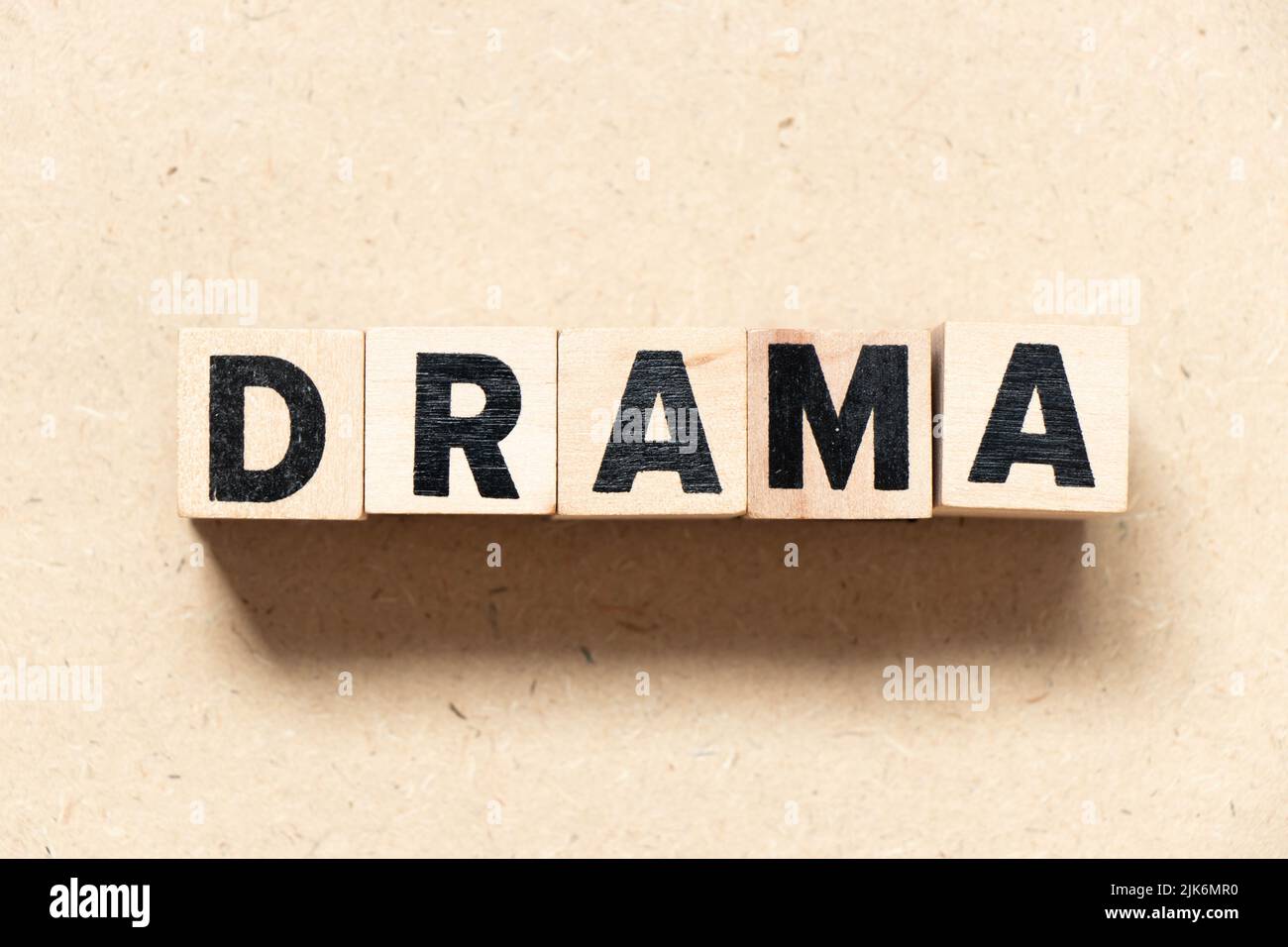 Alphabet letter block in word drama on wood background Stock Photo - Alamy