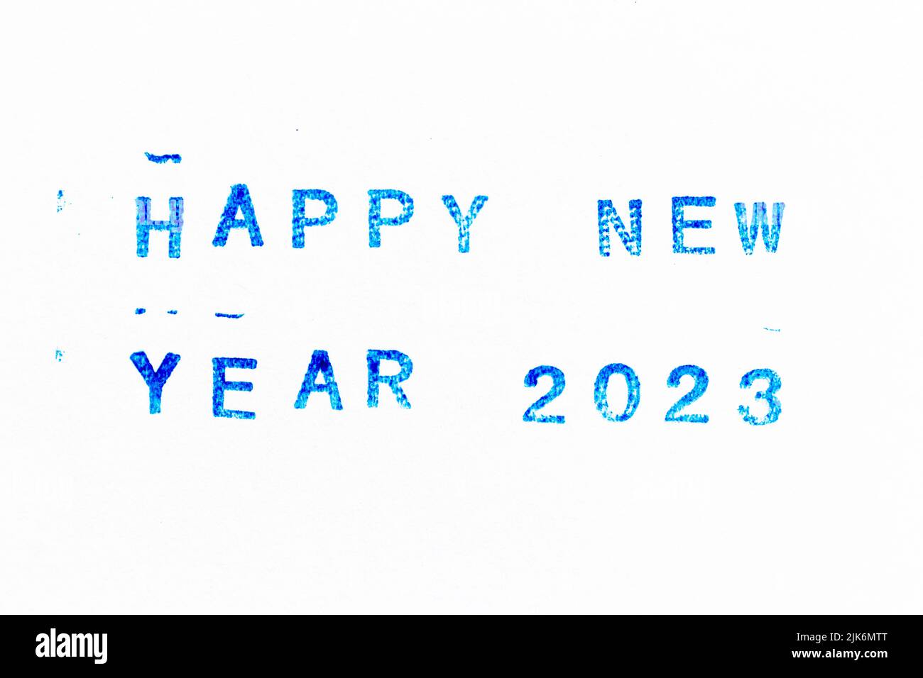 Blue color ink of rubber stamp in word happy new year 2023 on white ...