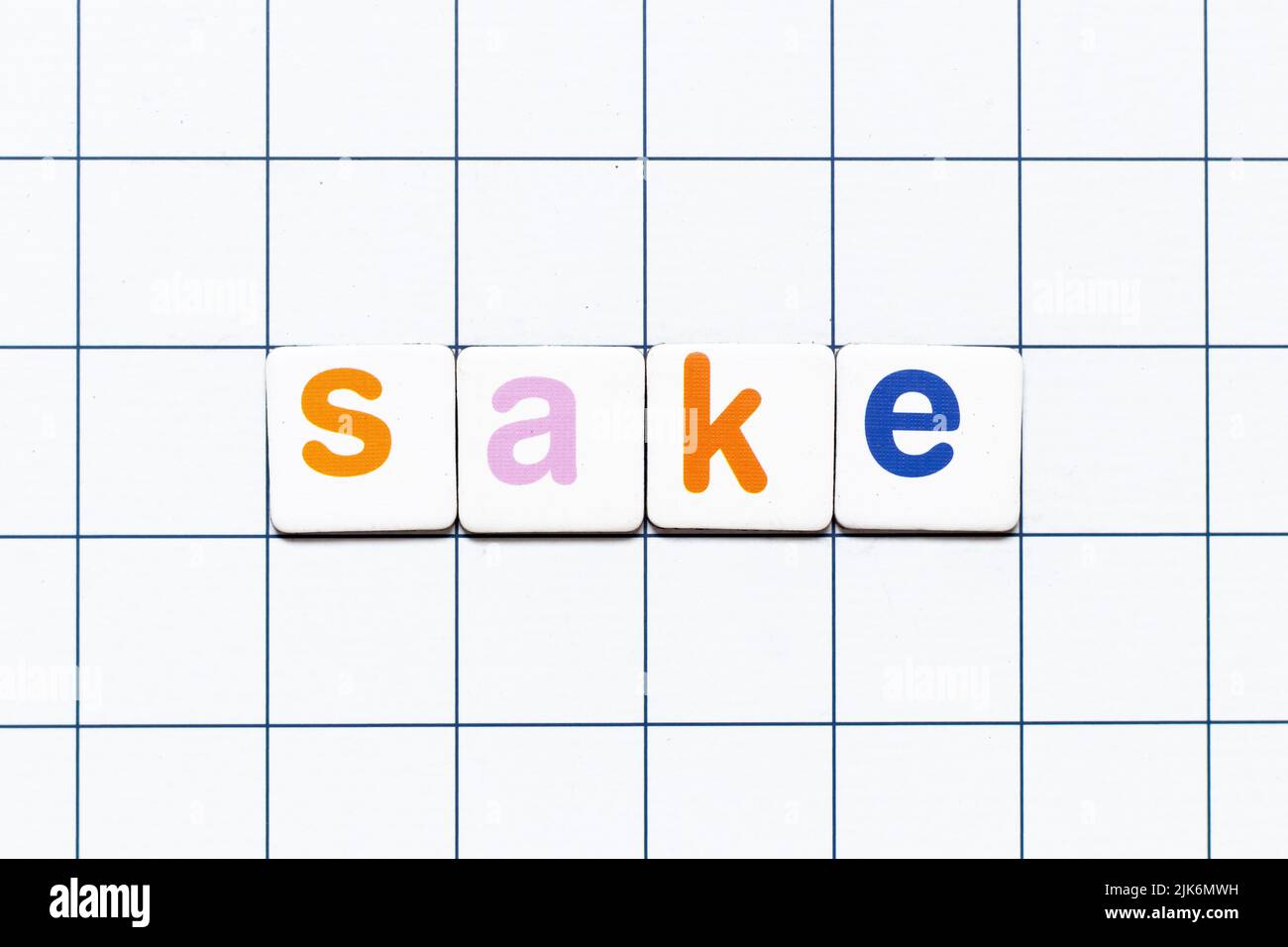 Colorful tile letter in word sake on white grid background Stock Photo ...