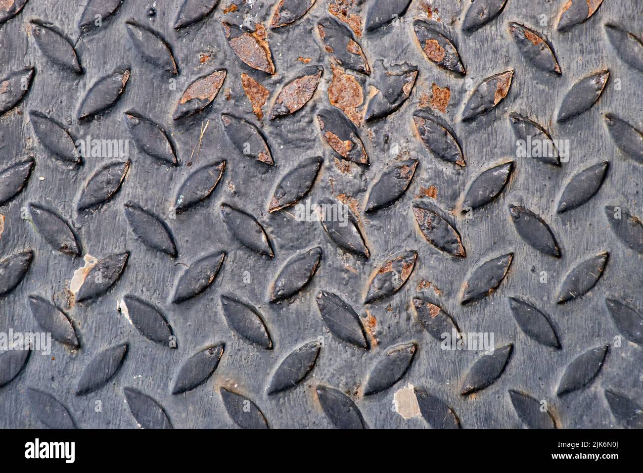 Black color non-slip metal with red rust textured background Stock ...