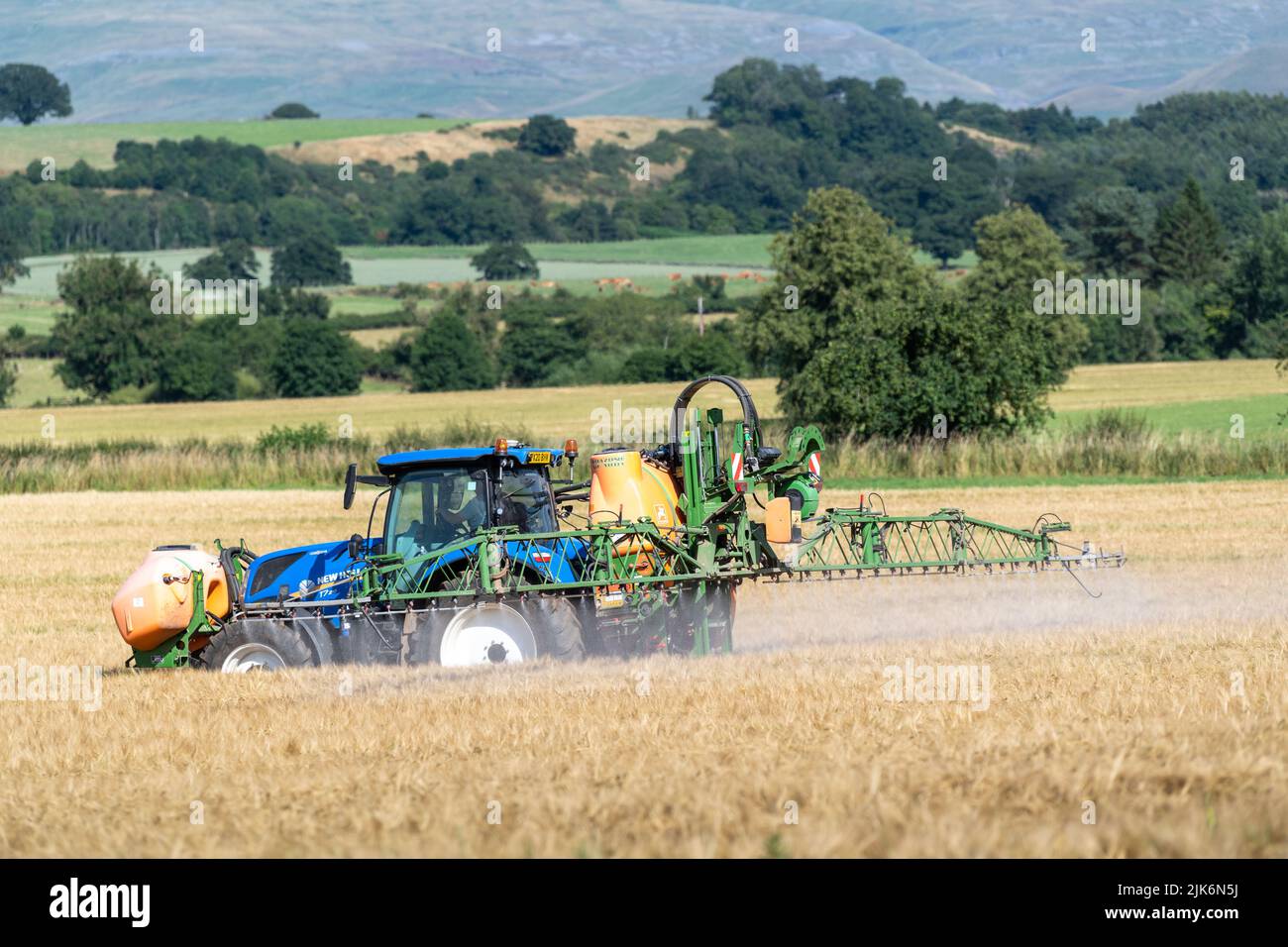 Spraying a field of nearly ripe barley with a glyphosate based ...