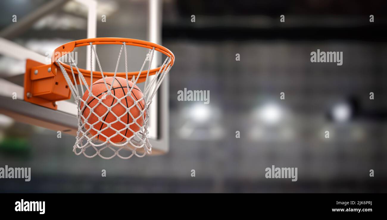 Basketball ball scoring the winning points on basketball net hoop on ...