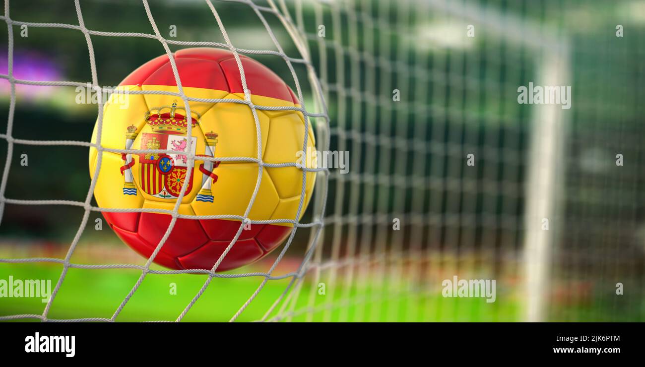 Football ball with flag of Spain in the net of goal of football stadium ...