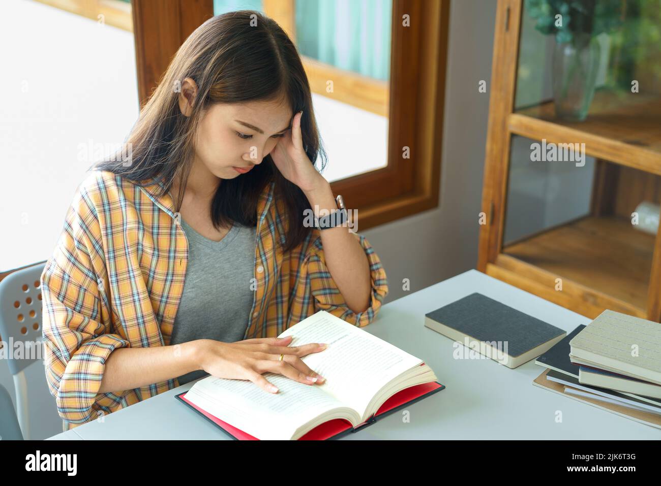 Education and literacy concept, College student girl feel confused ...