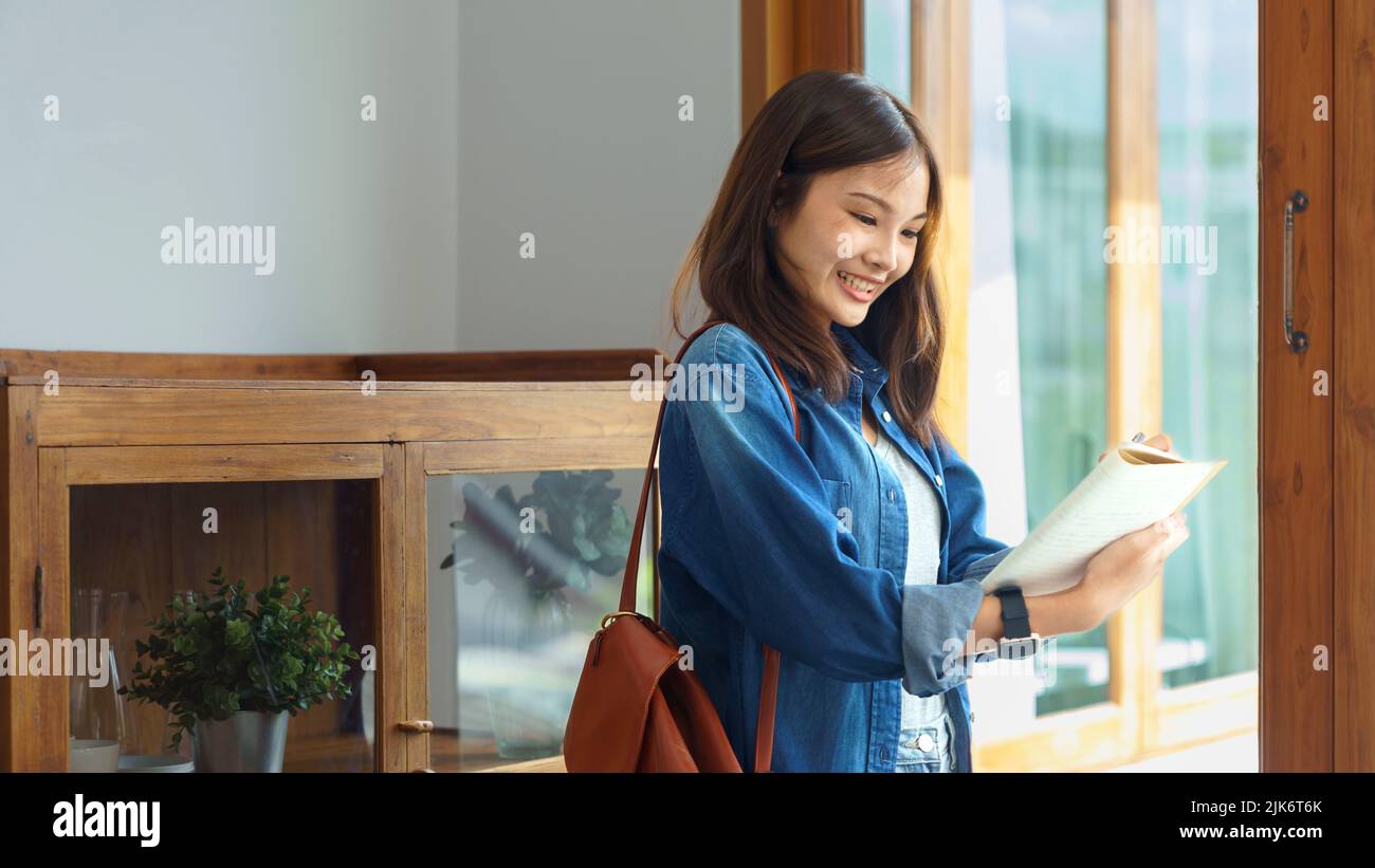 Education and literacy concept, College student girl standing in ...