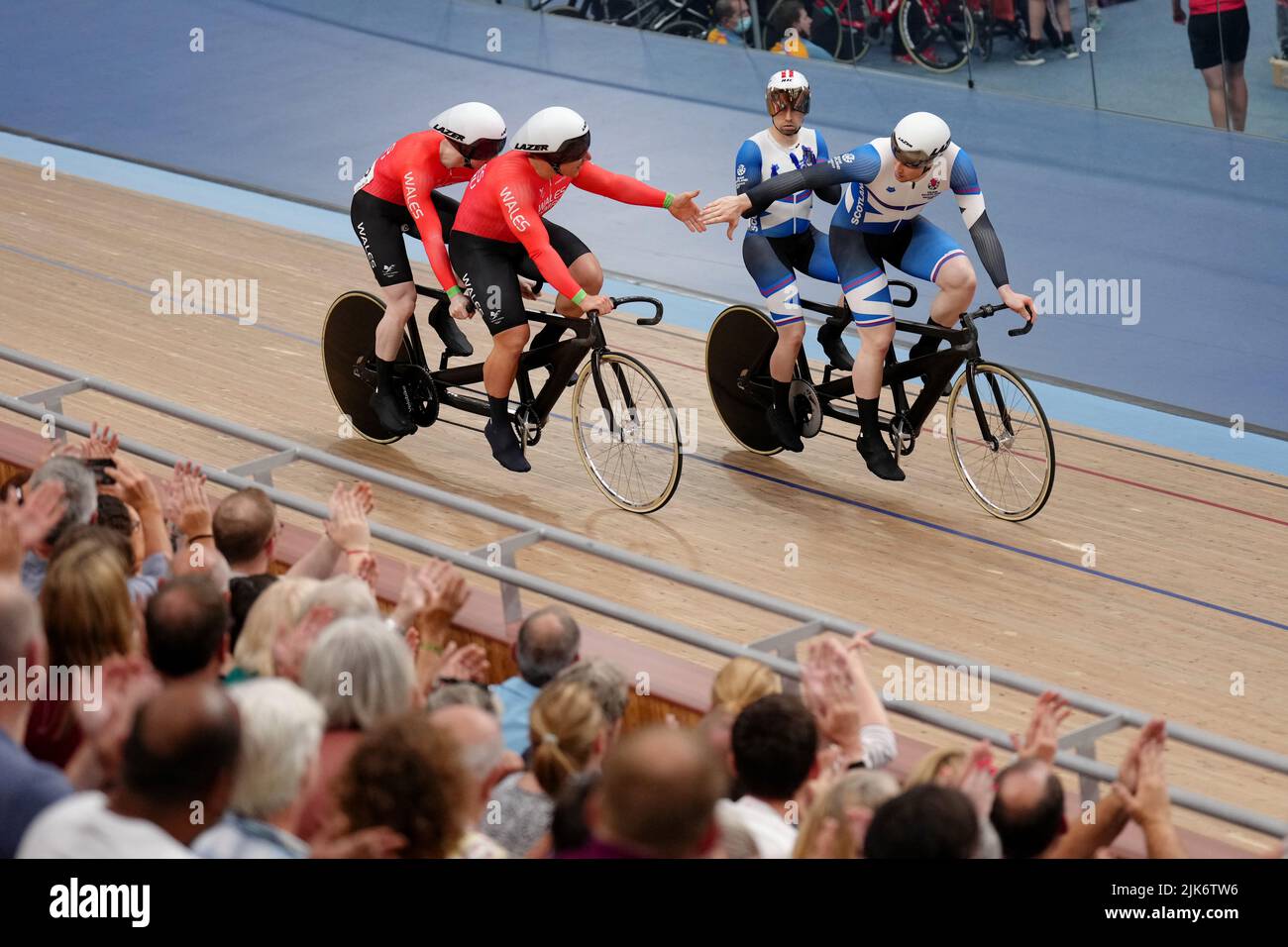 Wales’ James Ball and Matthew Rotherham are congratulated by Scotland’s ...