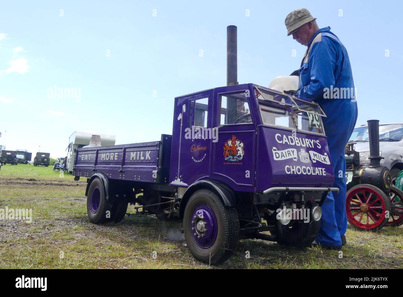 Flookburgh, Cumbria, UK. July 31st 2022. Cumbria A man fills the water ...