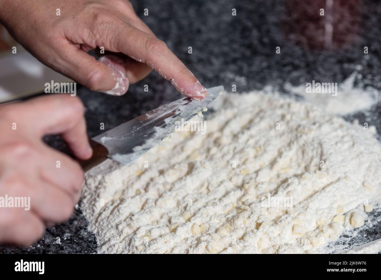 woman mixing flour with butter to prepare a cake Stock Photo - Alamy