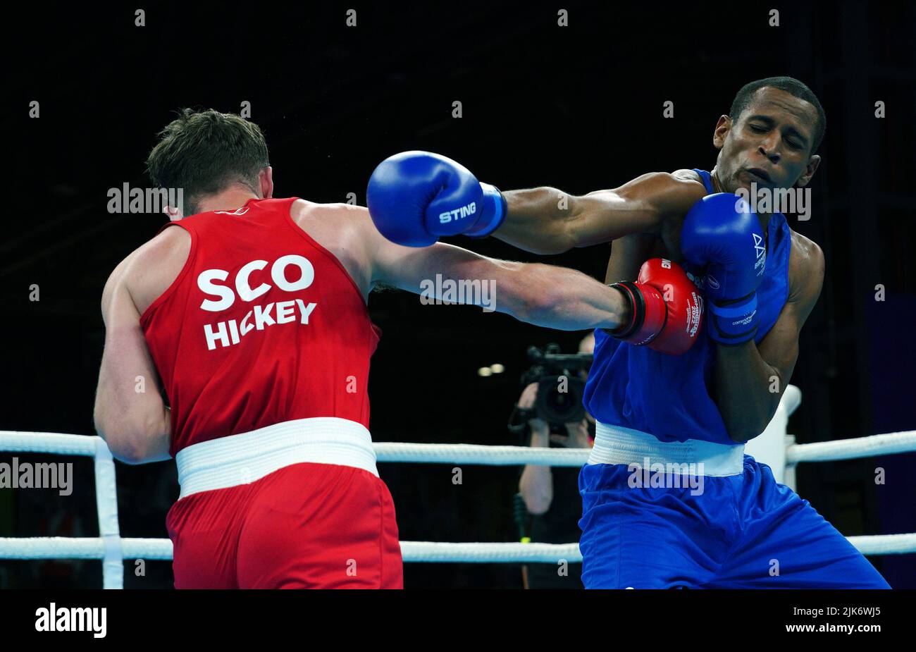 Scotland's Sam Hickey (Red) and St Lucia's Kyghan Mortley in the Men's ...