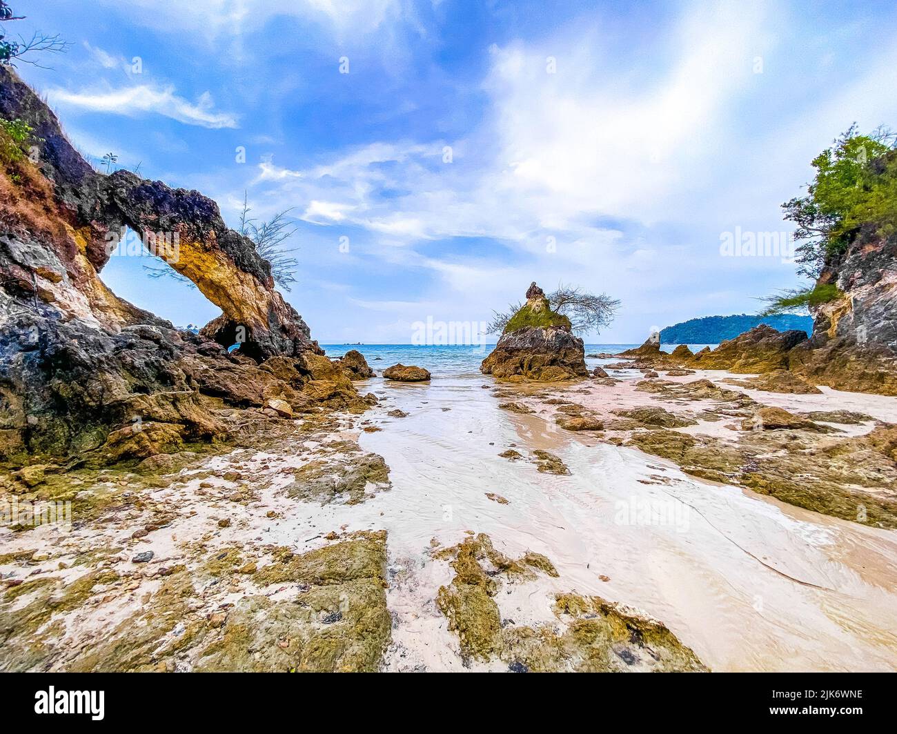Koh Phayam beach Hin Talu with rock arch formation in Ranong, Thailand ...