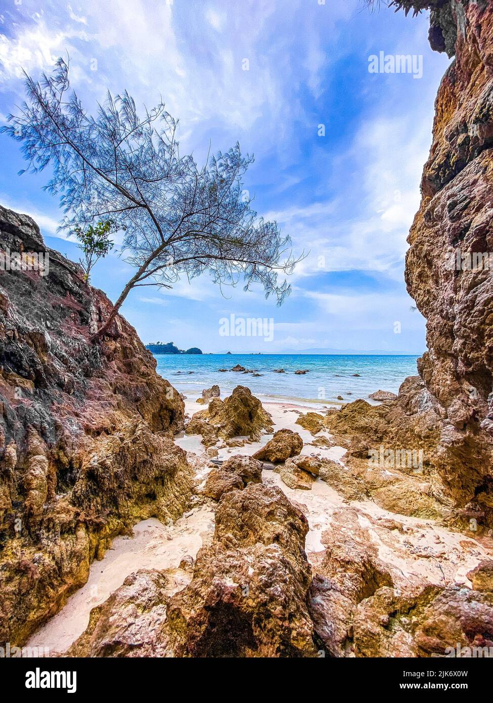 Koh Phayam beach Hin Talu with rock arch formation in Ranong, Thailand ...