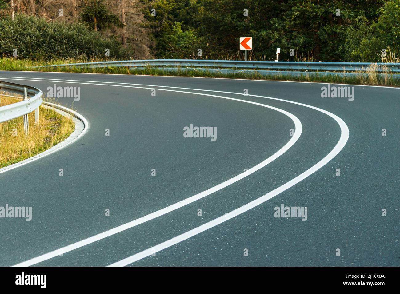 country road curve in the eifel germany in summer Stock Photo - Alamy