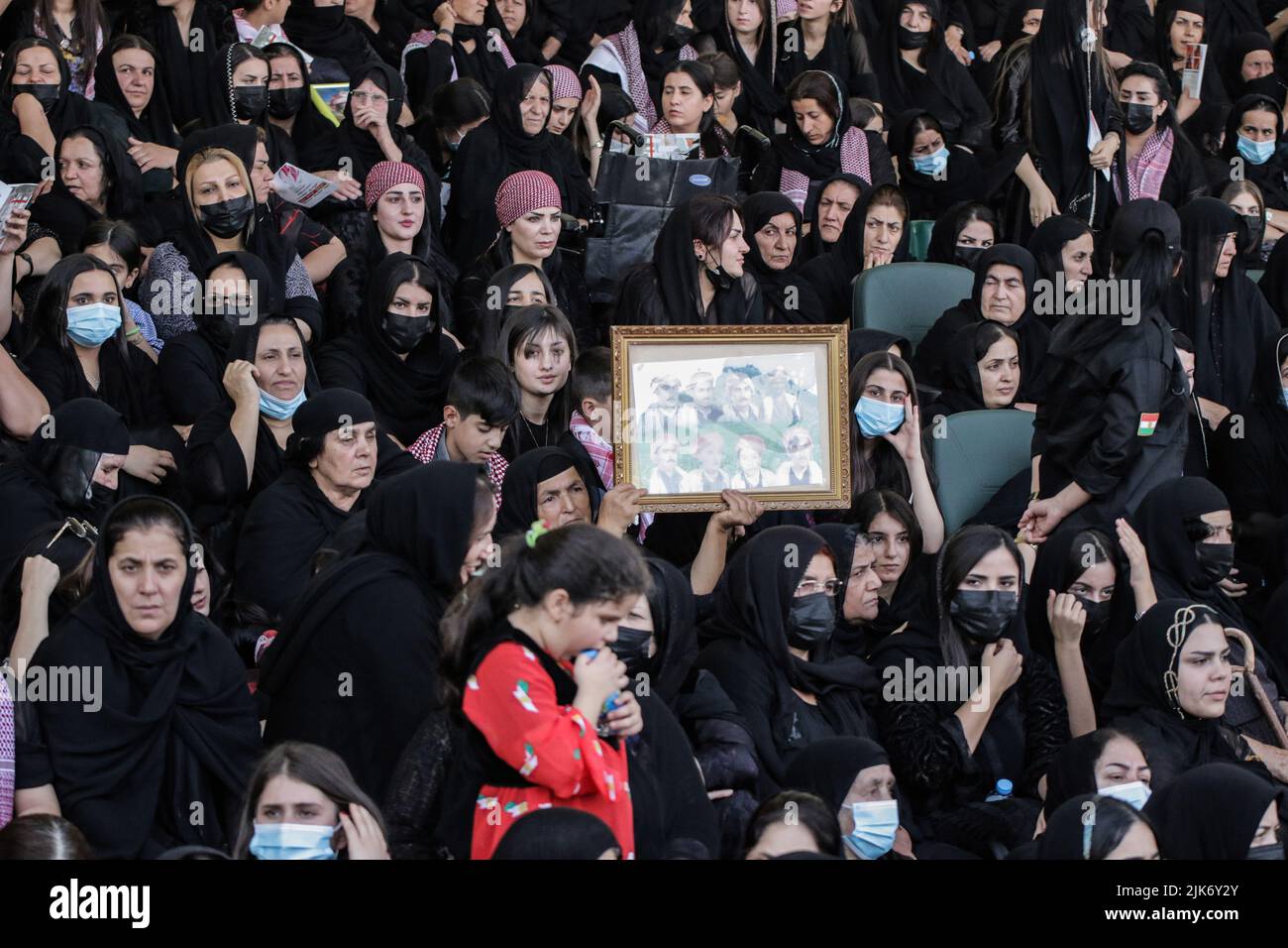 Barzan, Iraq. 31st July, 2022. Kurdish women attend a burial ceremony ...
