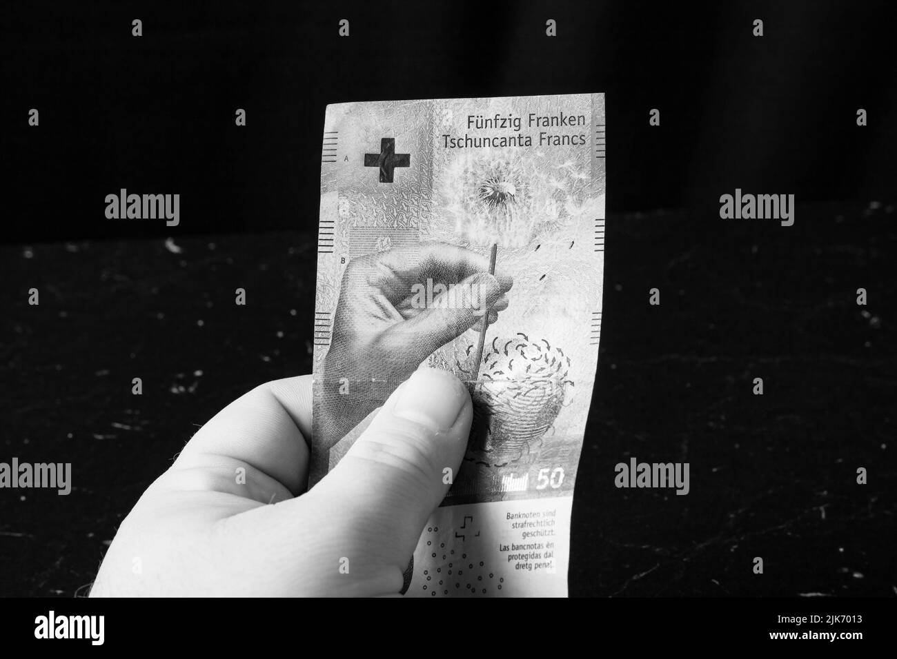 Swiss franc banknote. CHF currency. European inflation Stock Photo - Alamy