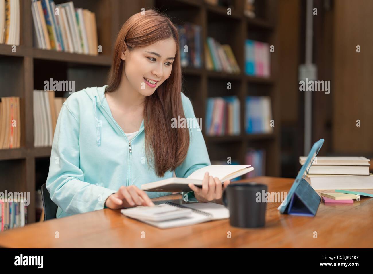 Education concept, Teenage girl watching video math tutorial and use ...