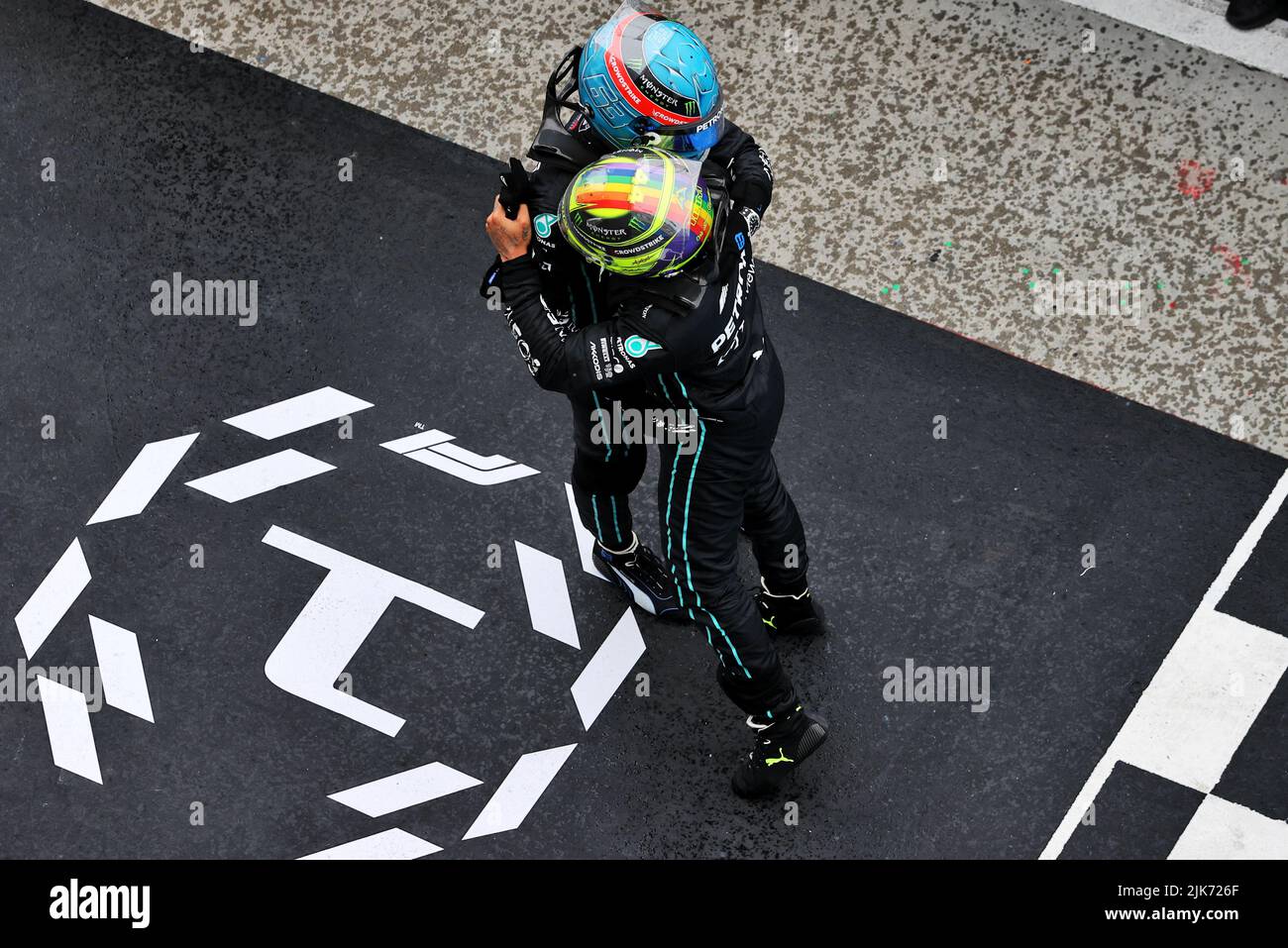 (L to R): George Russell (GBR) Mercedes AMG F1 celebrates his third ...