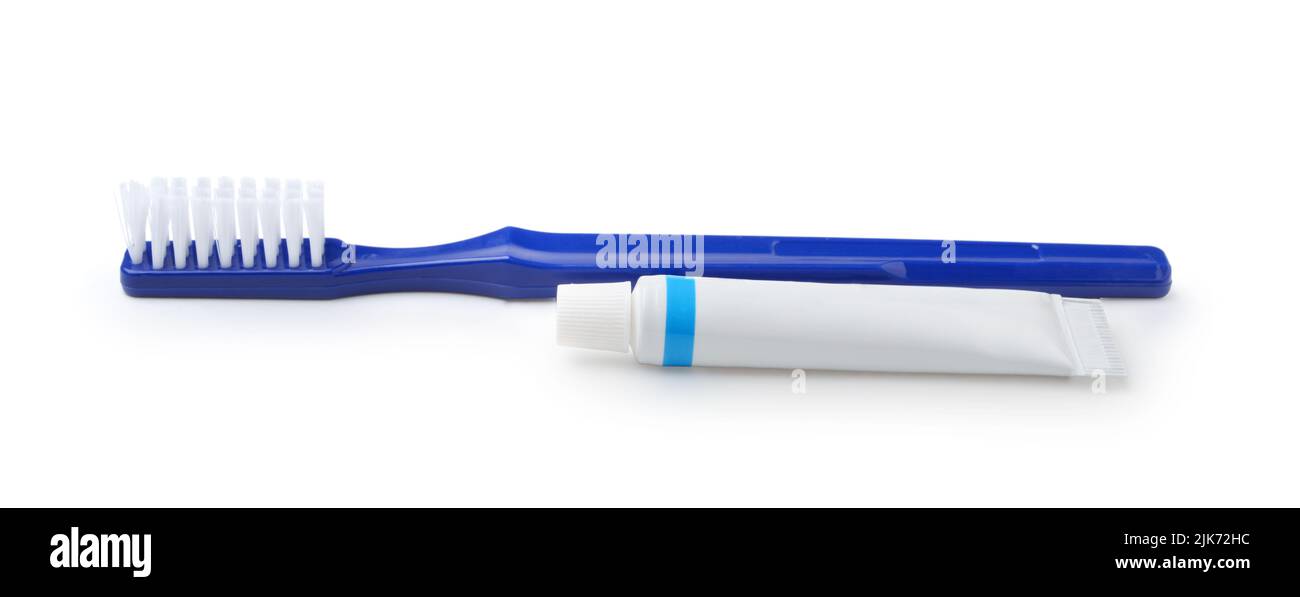 Blue toothbrush and toothpaste bottle isolated on white Stock Photo - Alamy