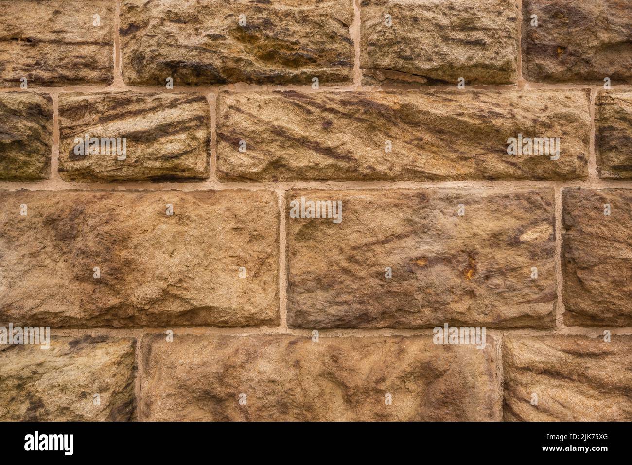 Geometric stone wall background texture, consisting of very large ...