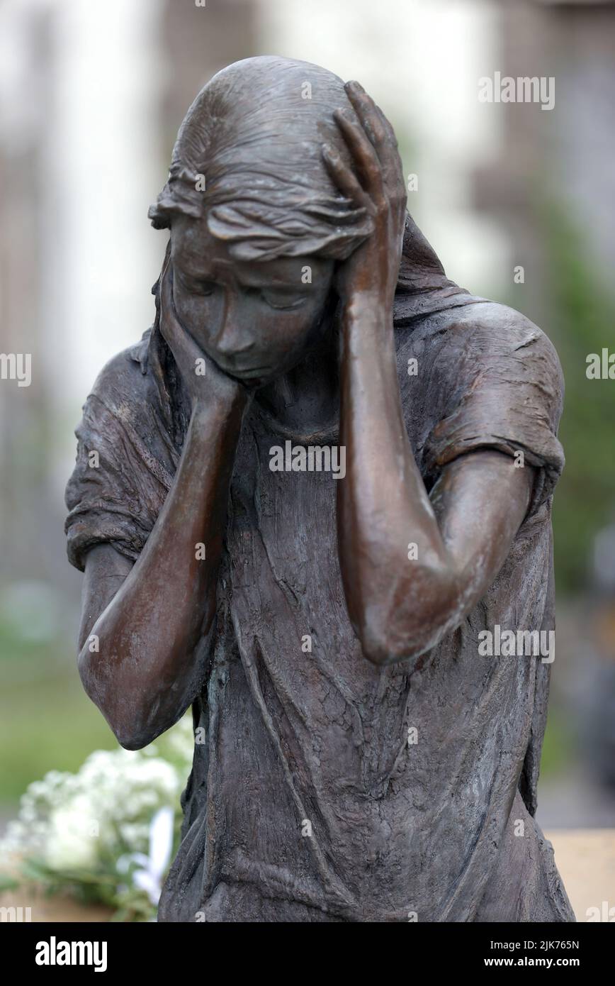 The memorial statue after the service in Claudy, Co Londonderry, to ...