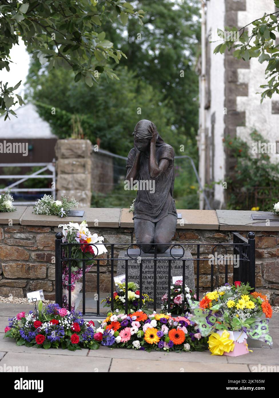 The memorial statue after the service in Claudy, Co Londonderry, to ...