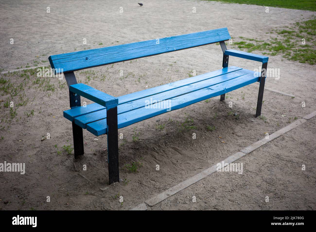 Blue wooden outdoor bench in a landscape design Stock Photo - Alamy