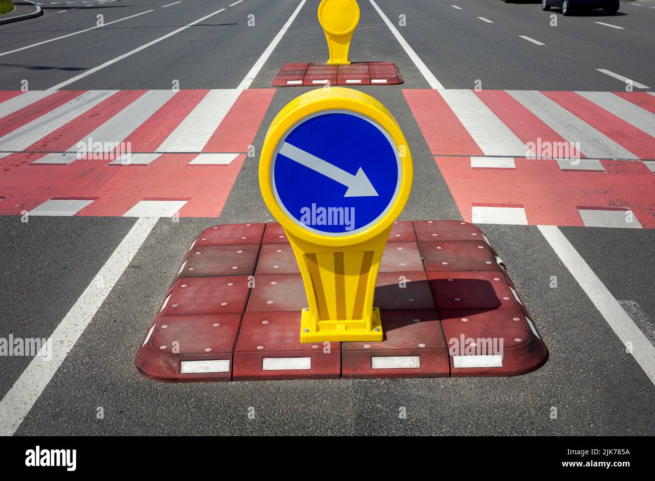 safety island with car traffic direction sign for auto, pedestrian ...