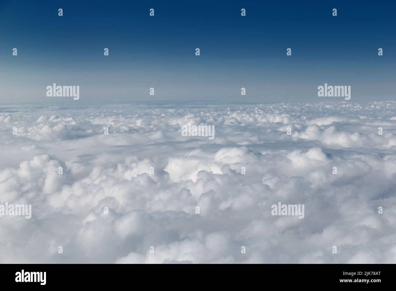 view of blue sky above clouds landscape Stock Photo - Alamy