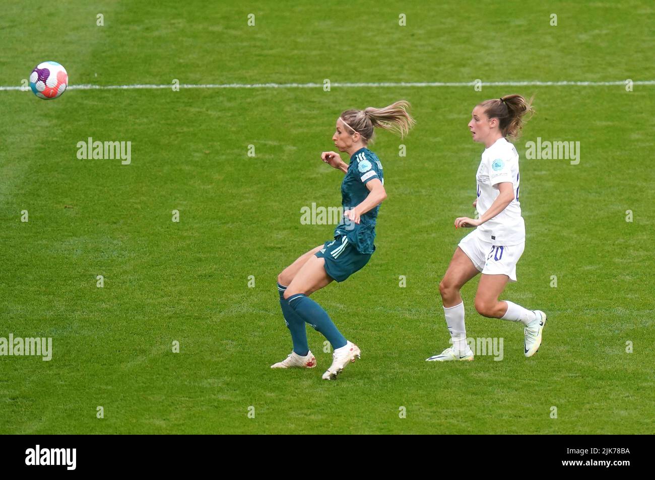 England's Ella Toone (right) scores their side's first goal of the game ...