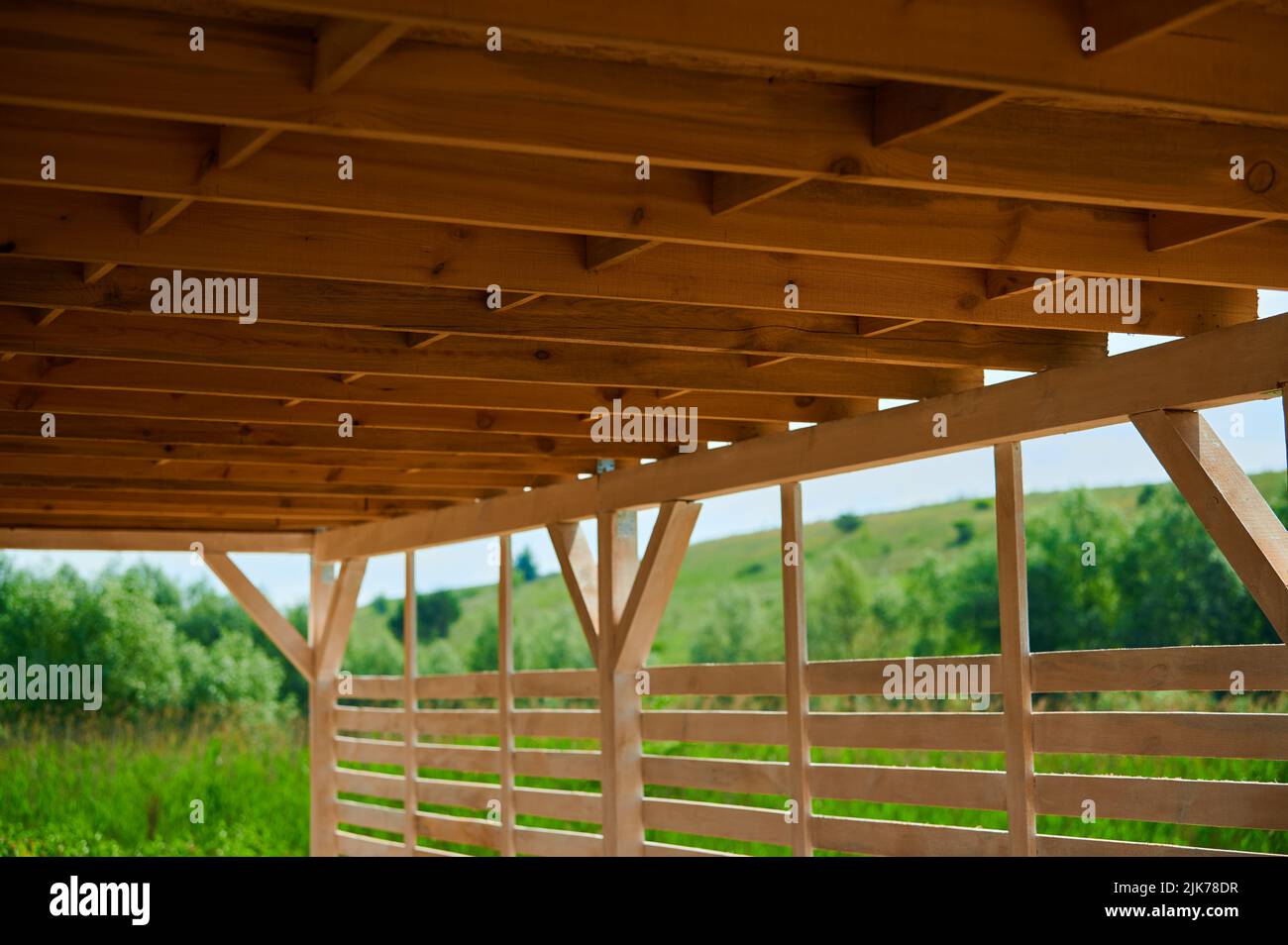 Roof of beams in a wooden gazebo under a canopy Stock Photo - Alamy