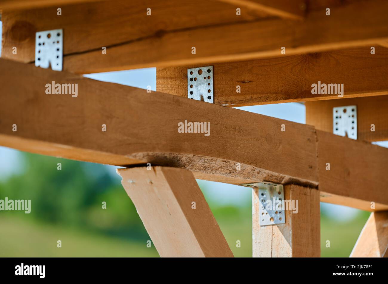 Wooden frame of rafters for the ceiling of the canopy from the sun and ...