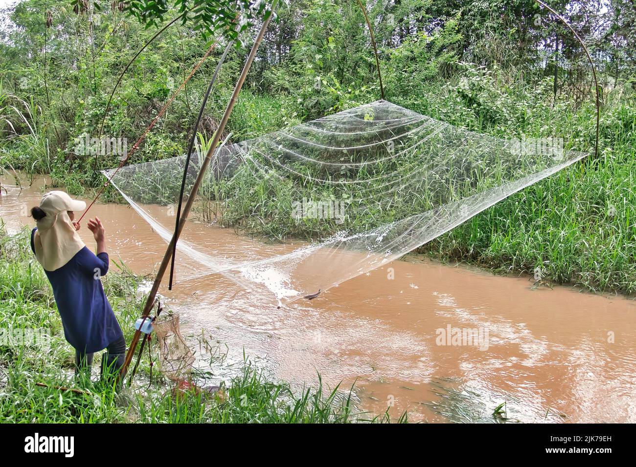 Asian woman fishing hi-res stock photography and images - Alamy