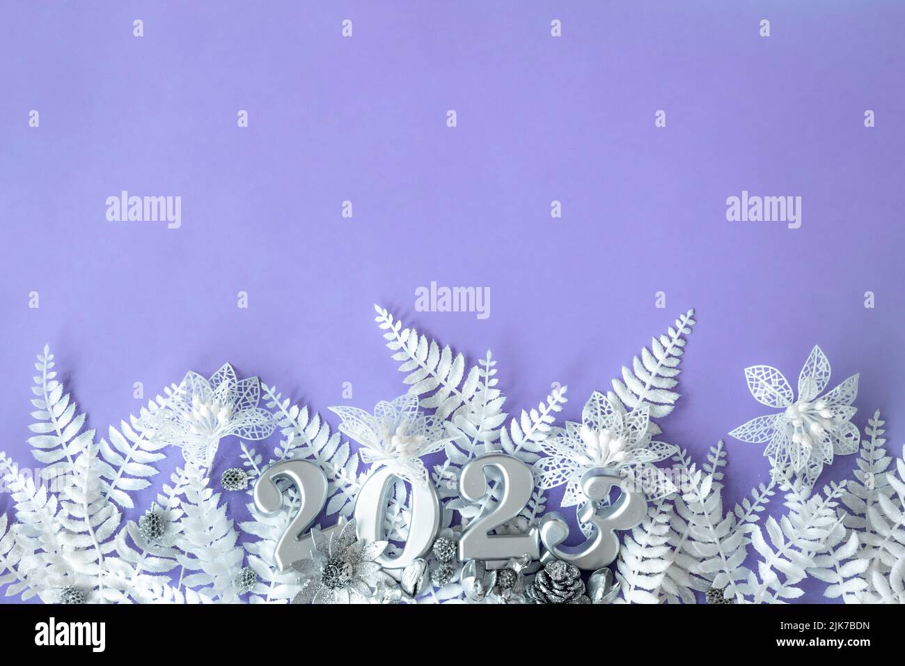 Lilac Christmas background with numbers 2023, flat lay Stock Photo - Alamy
