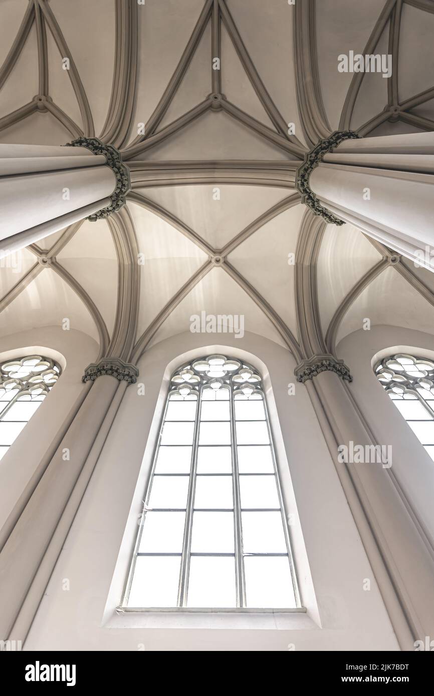Bright interior of the church with stained-glass windows, view from ...