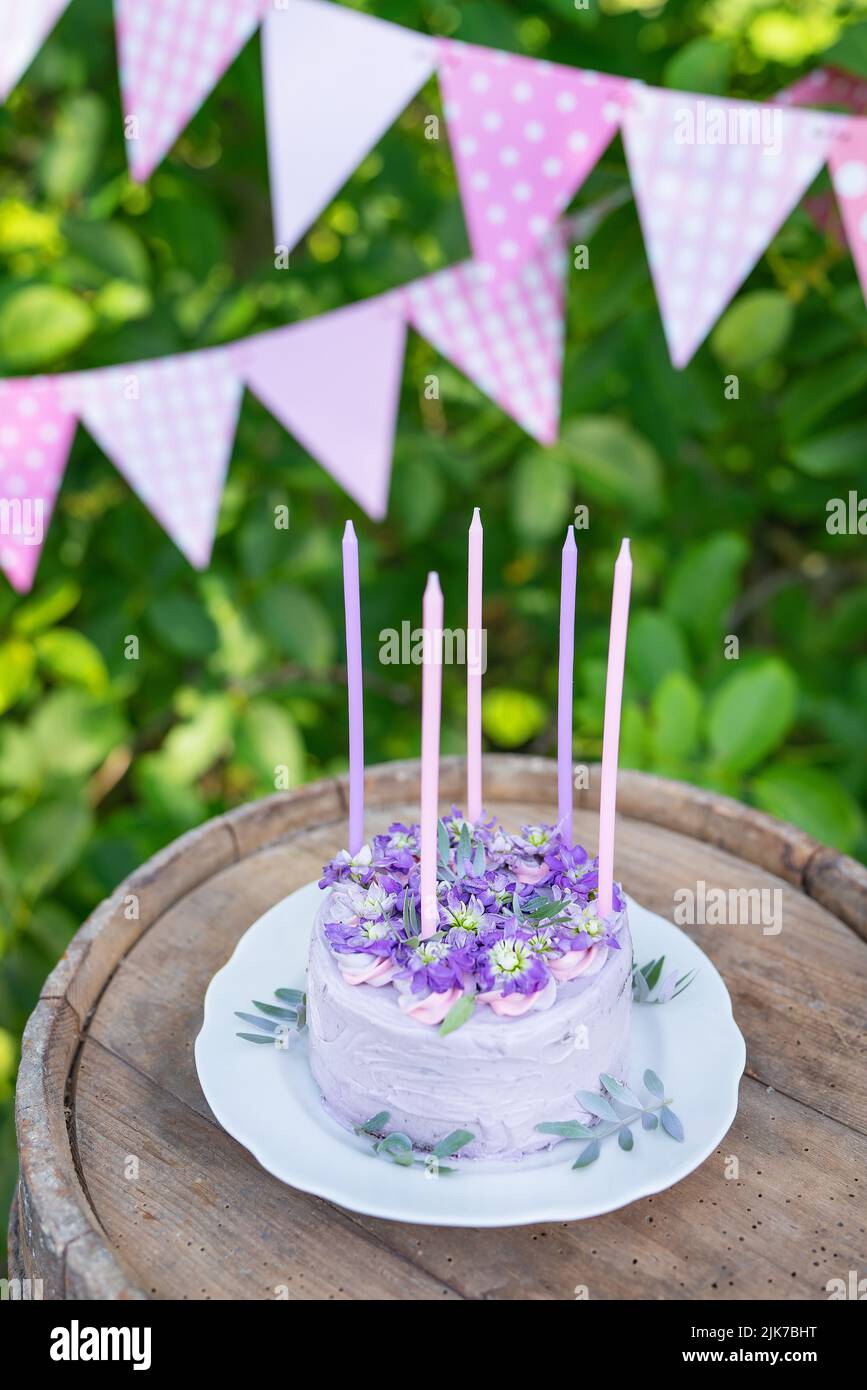 Very beautiful bento cake with purple, veri peri, matthiola flowers ...